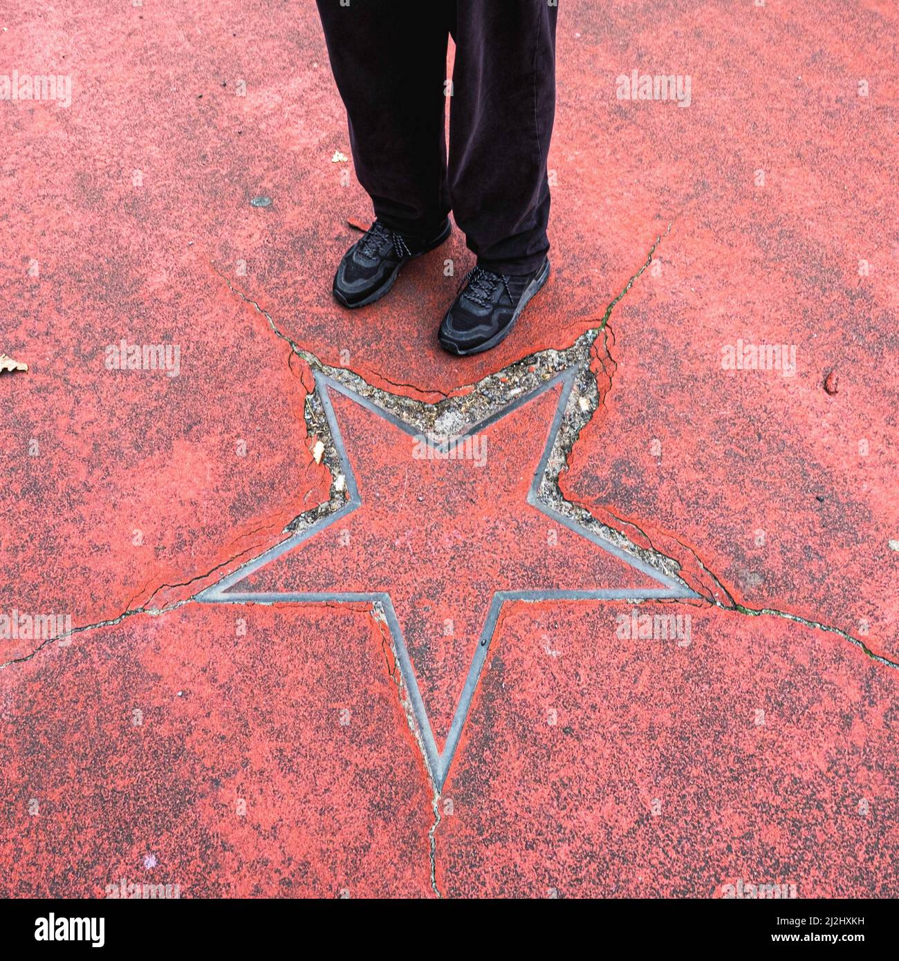 Empty star on cracked surface of Boulevard of Stars, in centre of ...