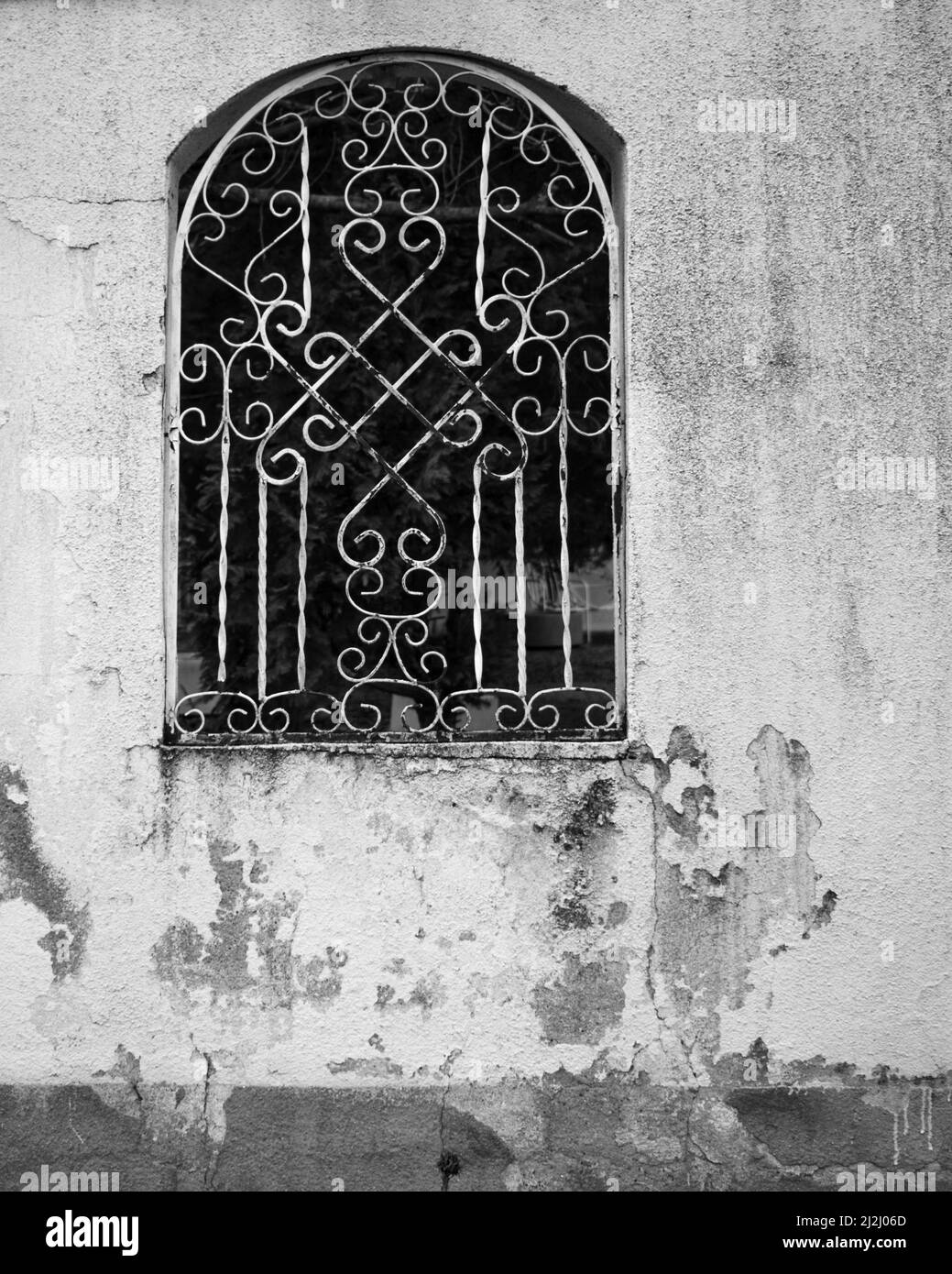 Iron fence stone wall Black and White Stock Photos & Images - Alamy