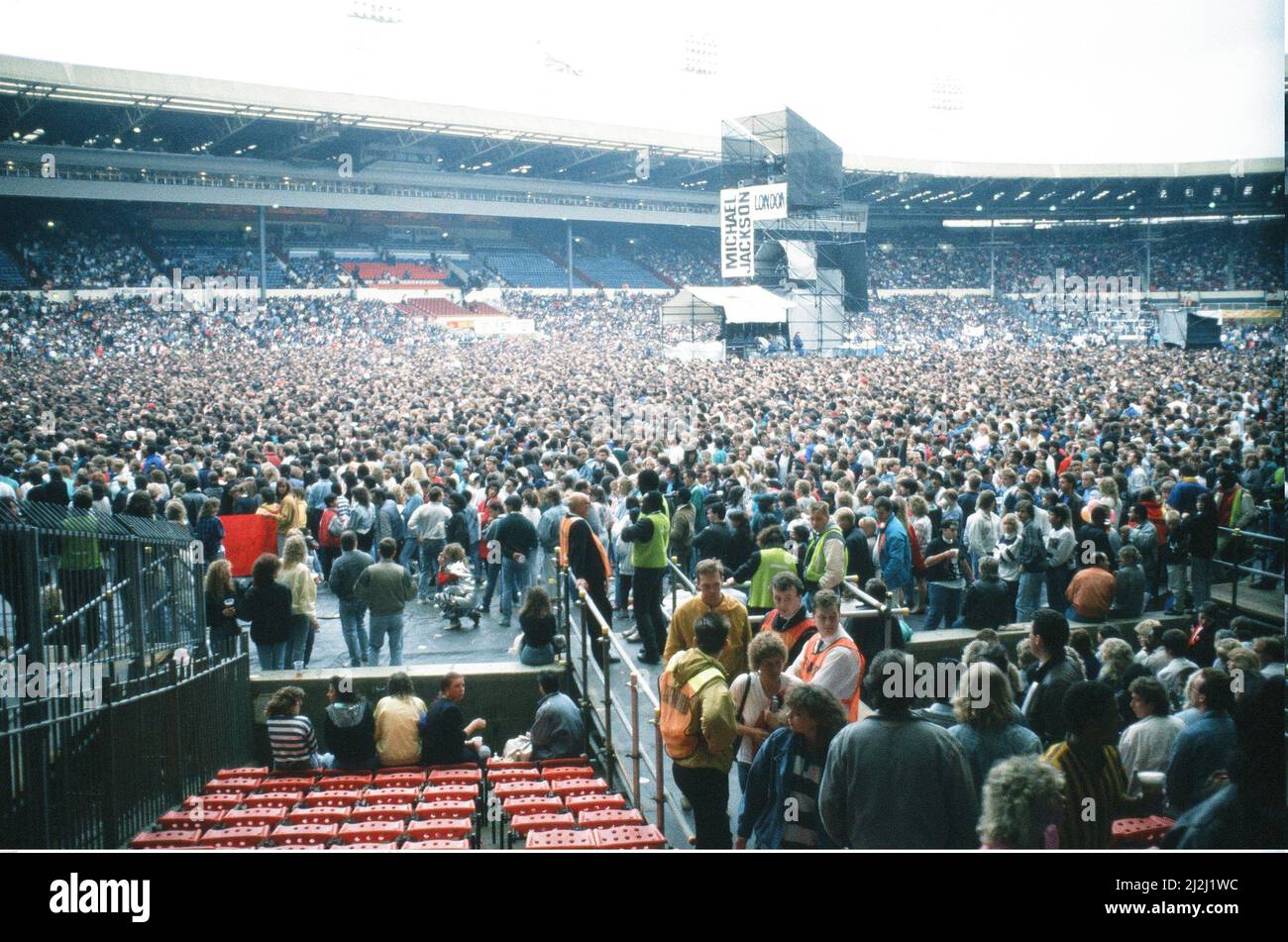 Audience gather outside the Wembley arena prior to the Michael Jackson ...
