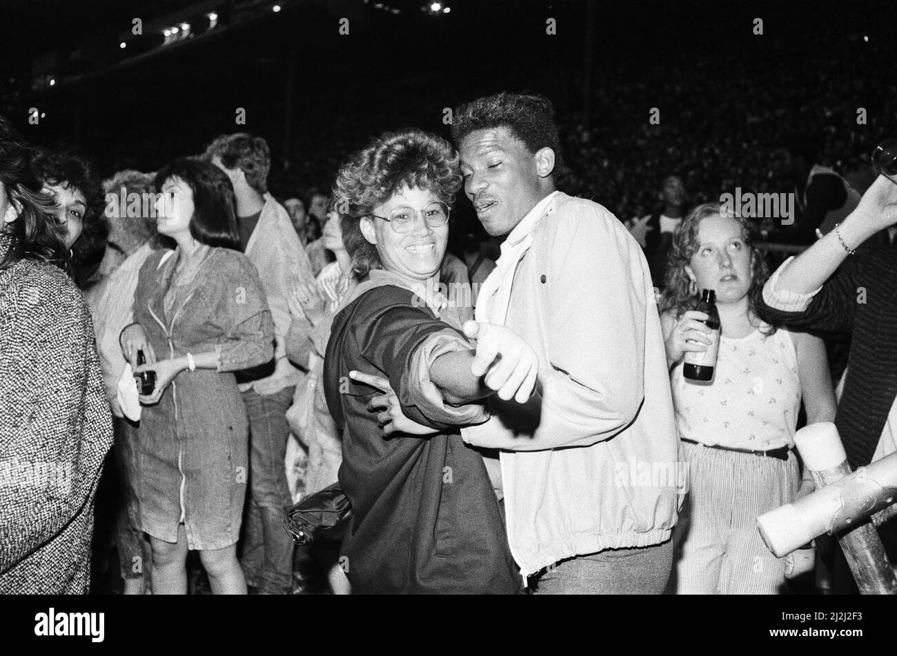 Michael Jackson fans in the audience at Wembley Stadium during his "Bad ...