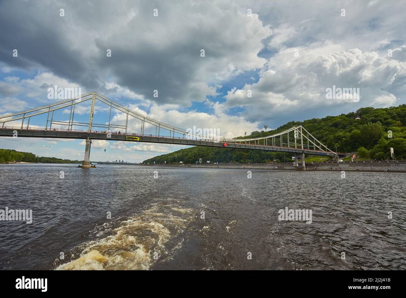 The pedestrian bridge across the Dnieper. Suspension bridge in Kiev ...