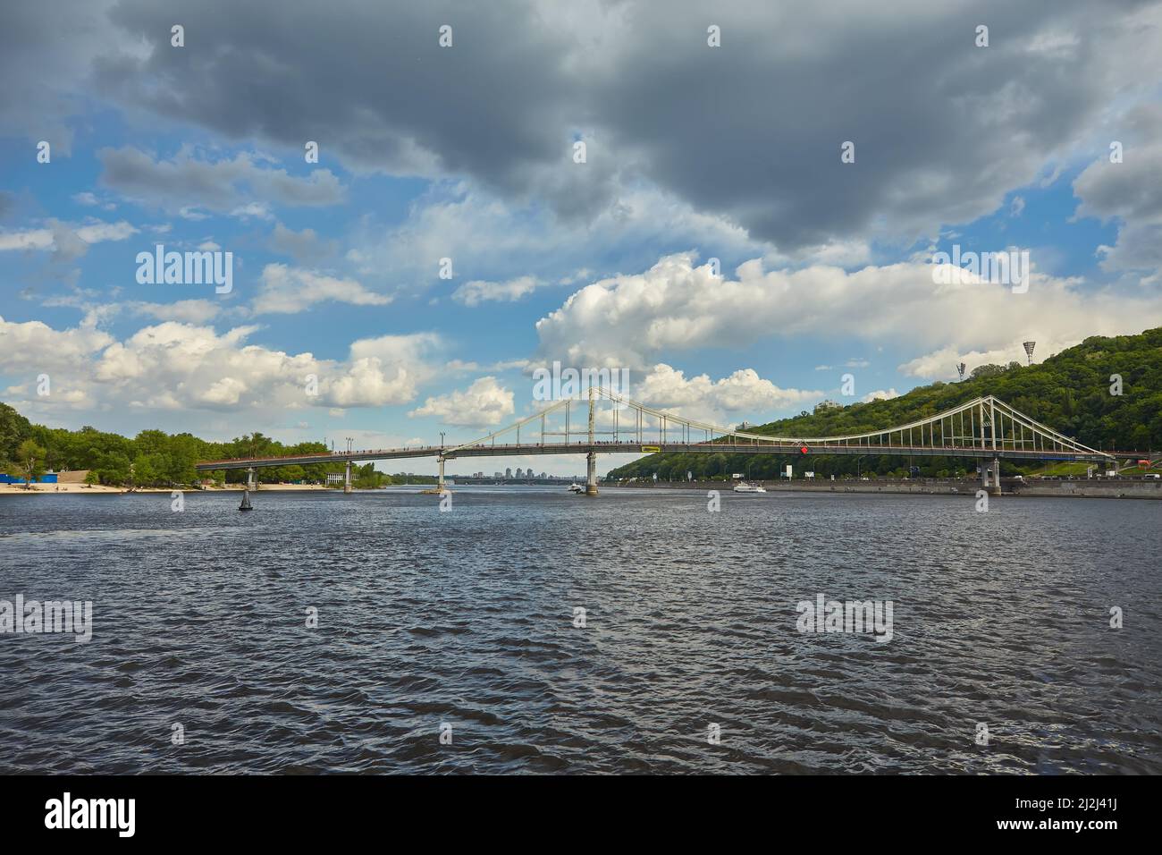 The pedestrian bridge across the Dnieper. Suspension bridge in Kiev ...