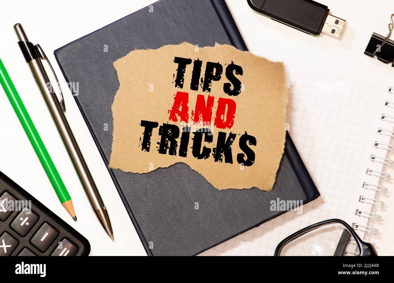 Tips and tricks written on book with wooden background Stock Photo - Alamy