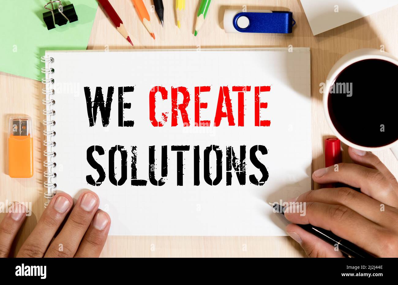 text text We create solutions appearing behind torn brown paper Stock ...