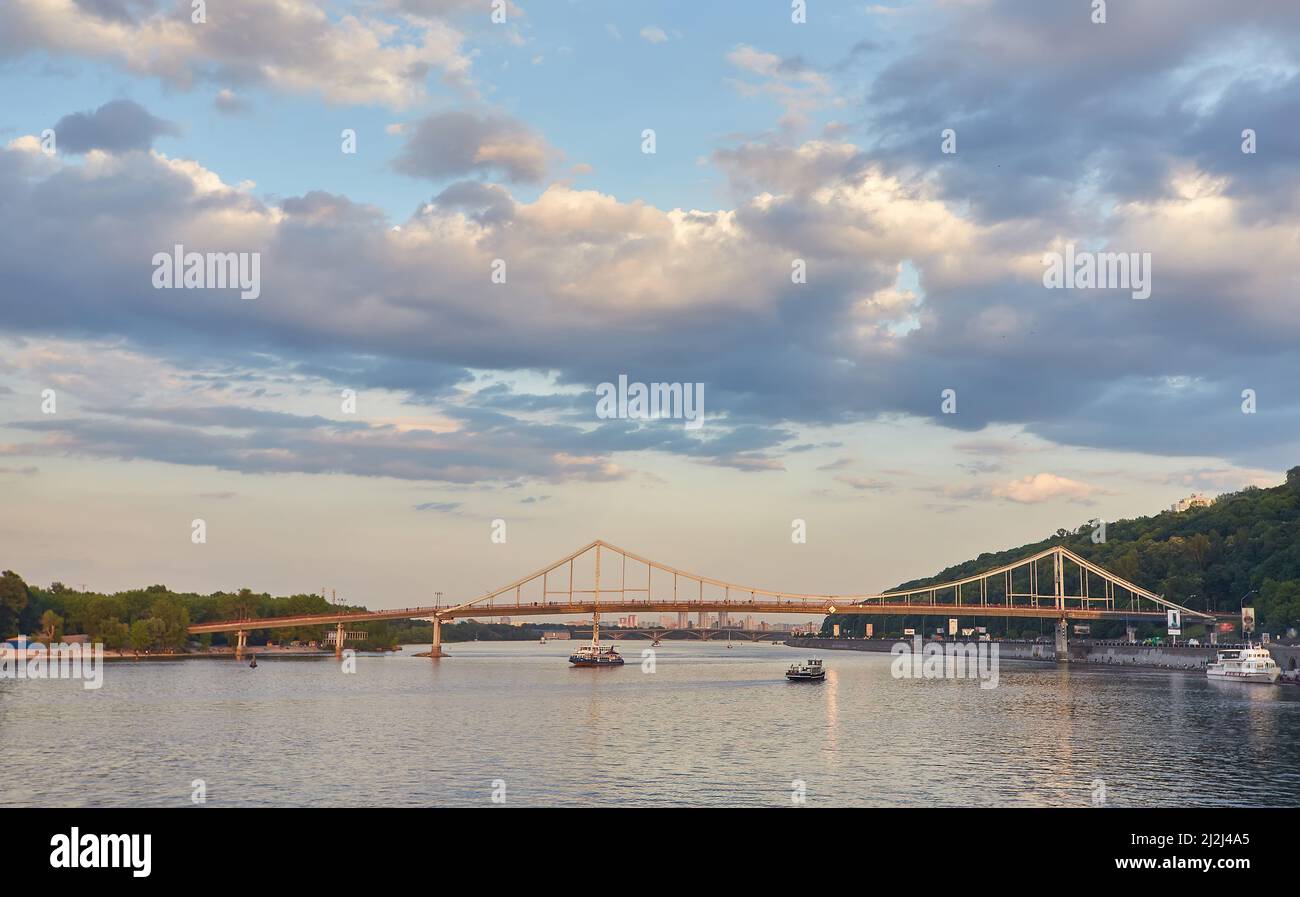 The pedestrian bridge across the Dnieper. Suspension bridge in Kiev ...