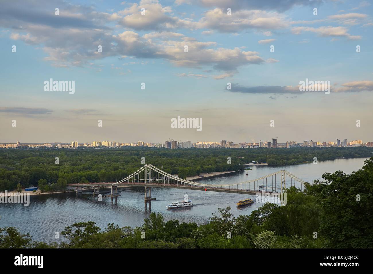The pedestrian bridge across the Dnieper. Suspension bridge in Kiev ...