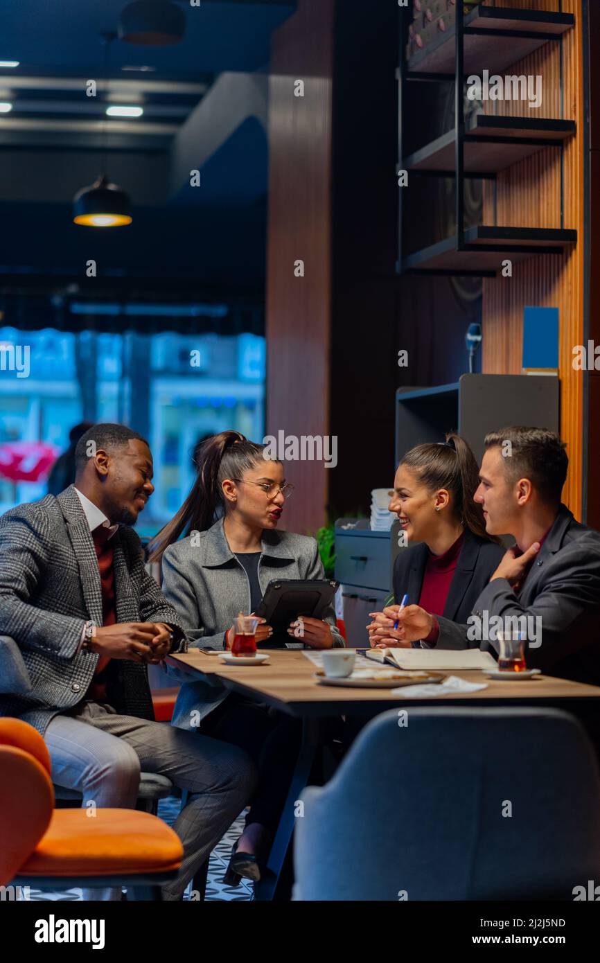 Group of multiracial busniess people are smiling together while talking ...