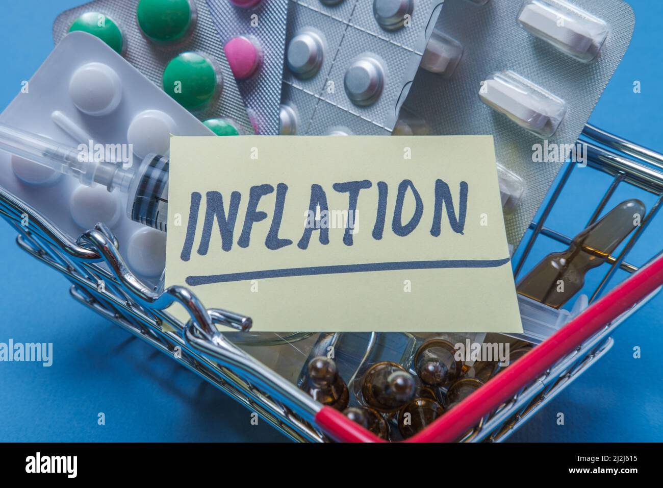 A basket with medical preparations in it on a blue background with ...