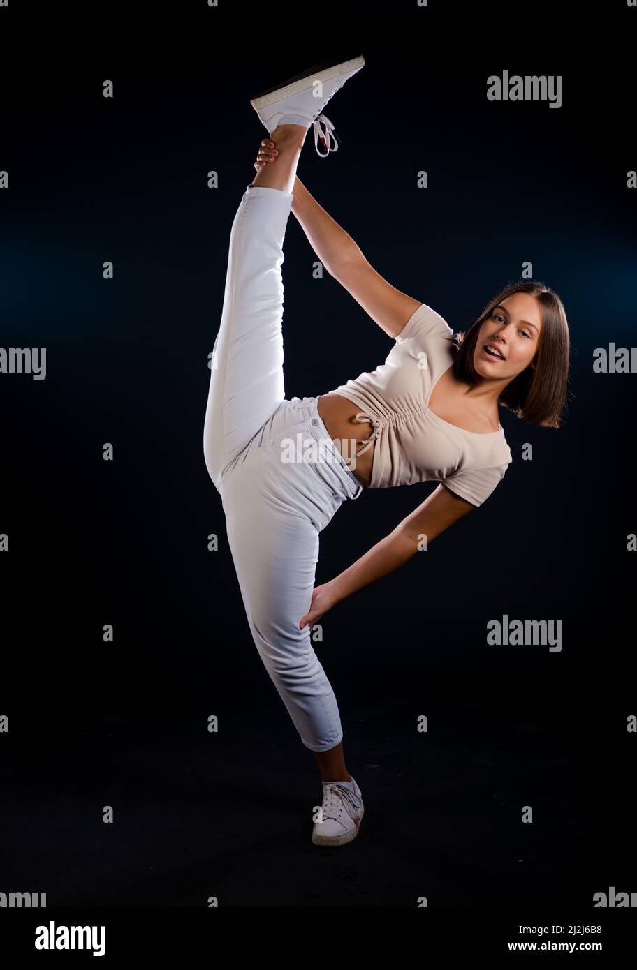 Full size profile photo of funky lady raise leg in air good mood Stock ...