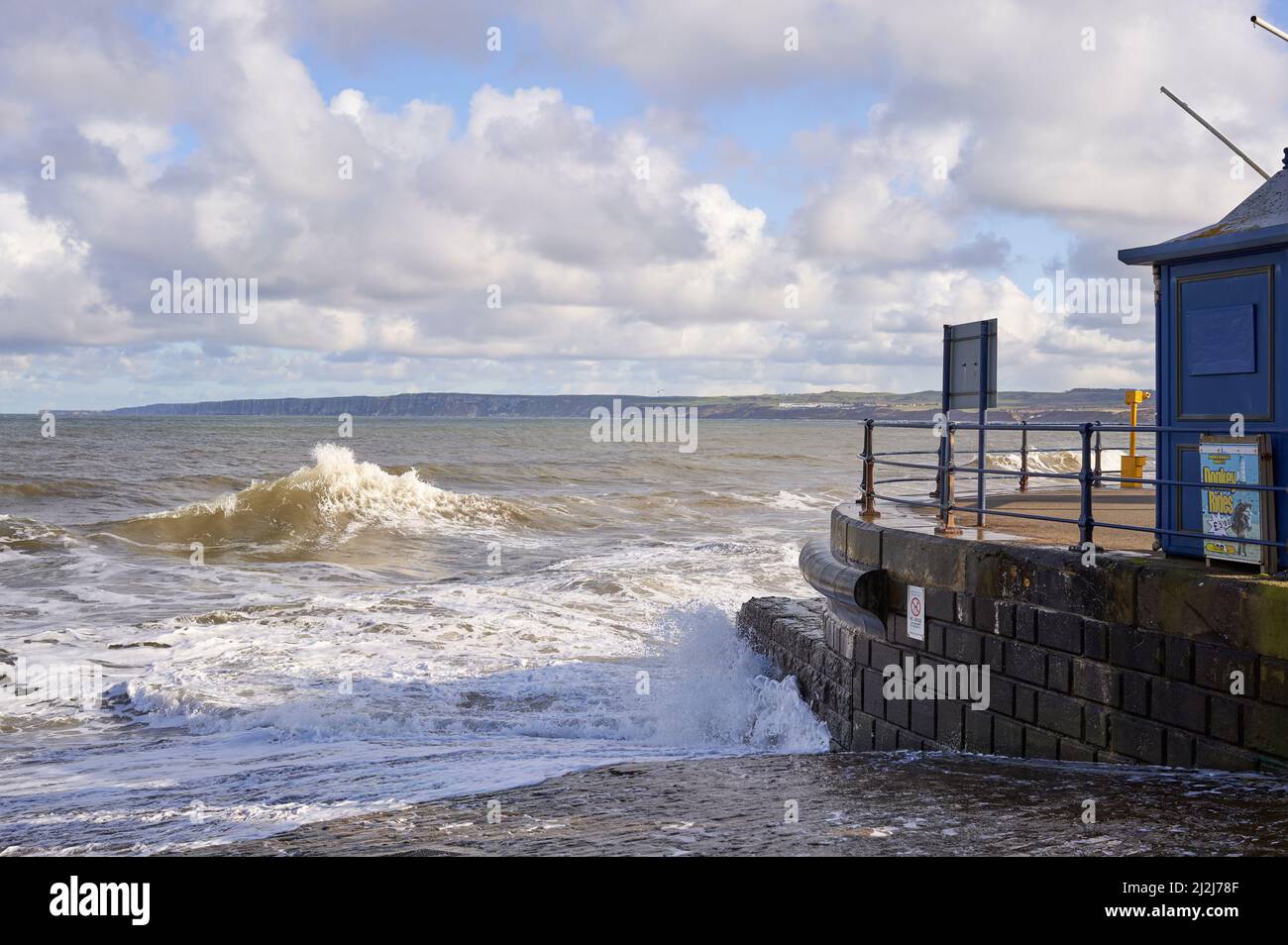 Violent waves washing against a sea front Stock Photo - Alamy