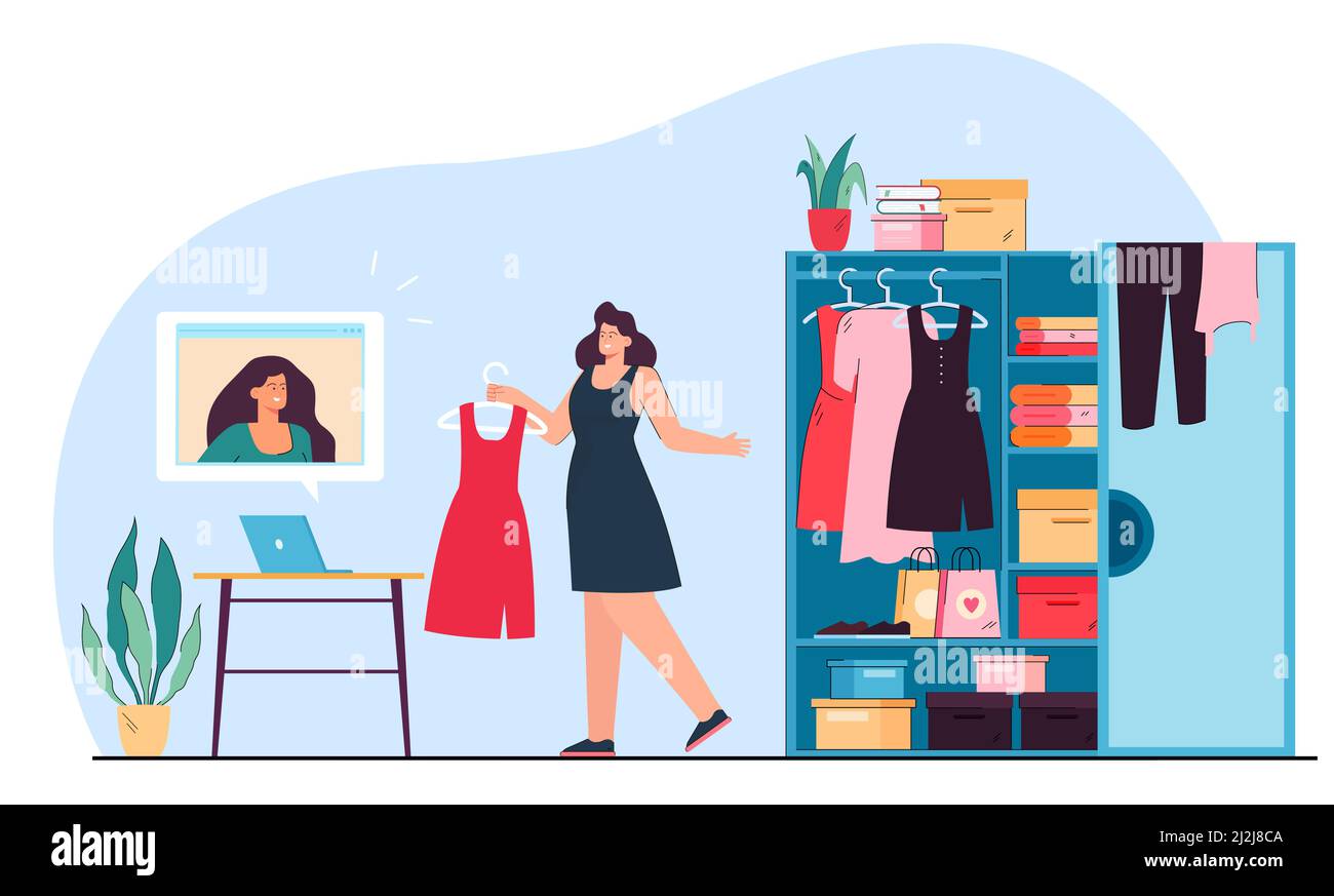 Woman getting clothes from wardrobe and choosing outfit in front of ...