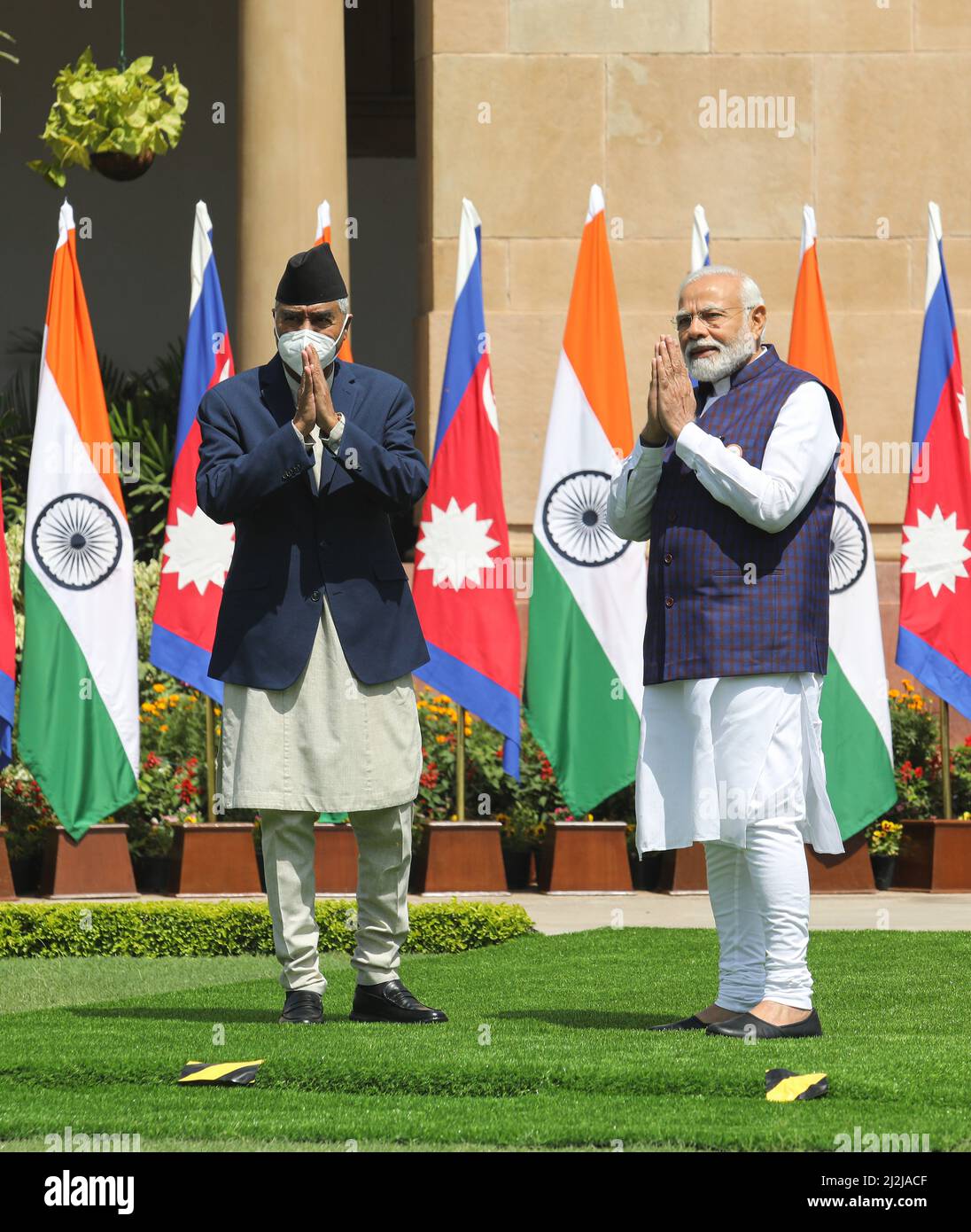 Indian Prime Minister Narendra Modi (R) and Nepal's Prime Minister Sher ...