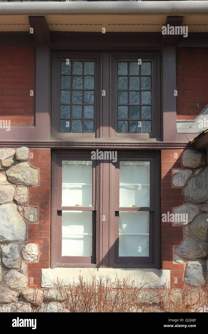 Vintage wooden windows on a charming rustic stone cottage Stock Photo ...