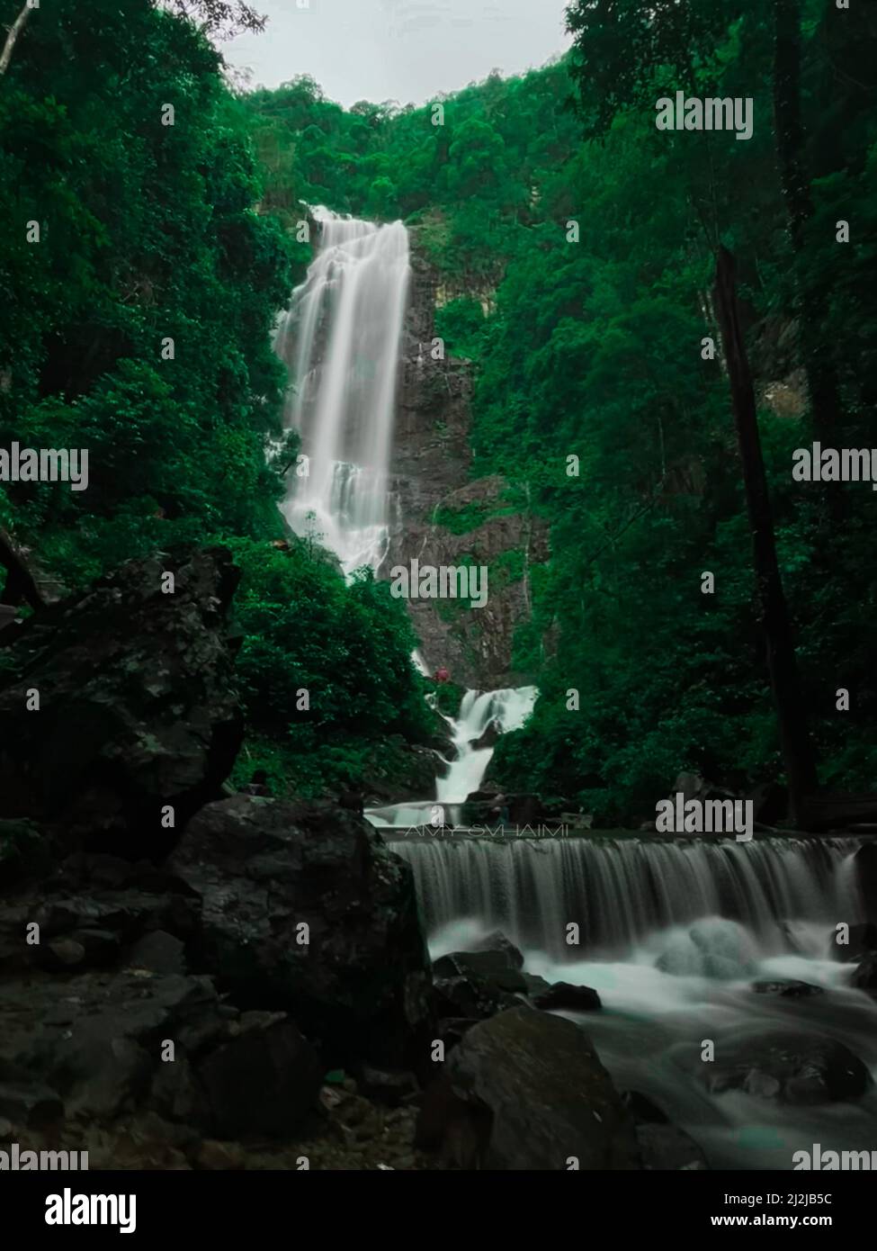 The beautiful Temurun Waterfall shot in the middle of the forest ...