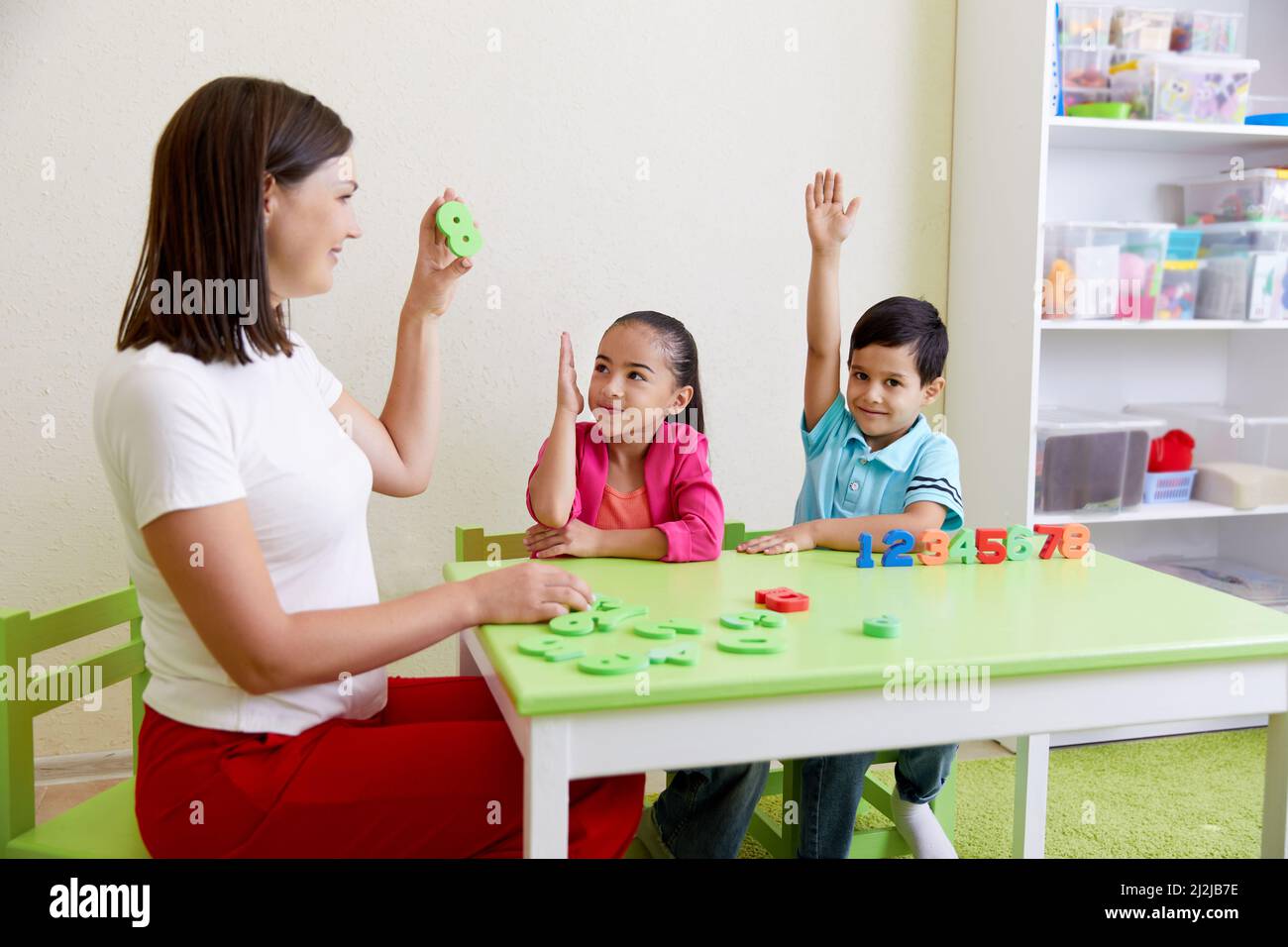 Children practice correct pronunciation with speech therapist Stock ...