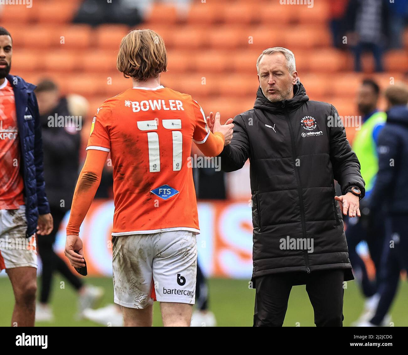 Neil Critchley head coach of Blackpool shakes Josh Bowler #11 of ...
