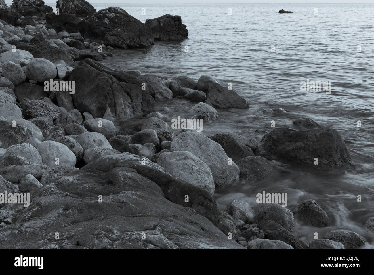 Background of stone beach with rocks, close-up. Grey stone beach for ...