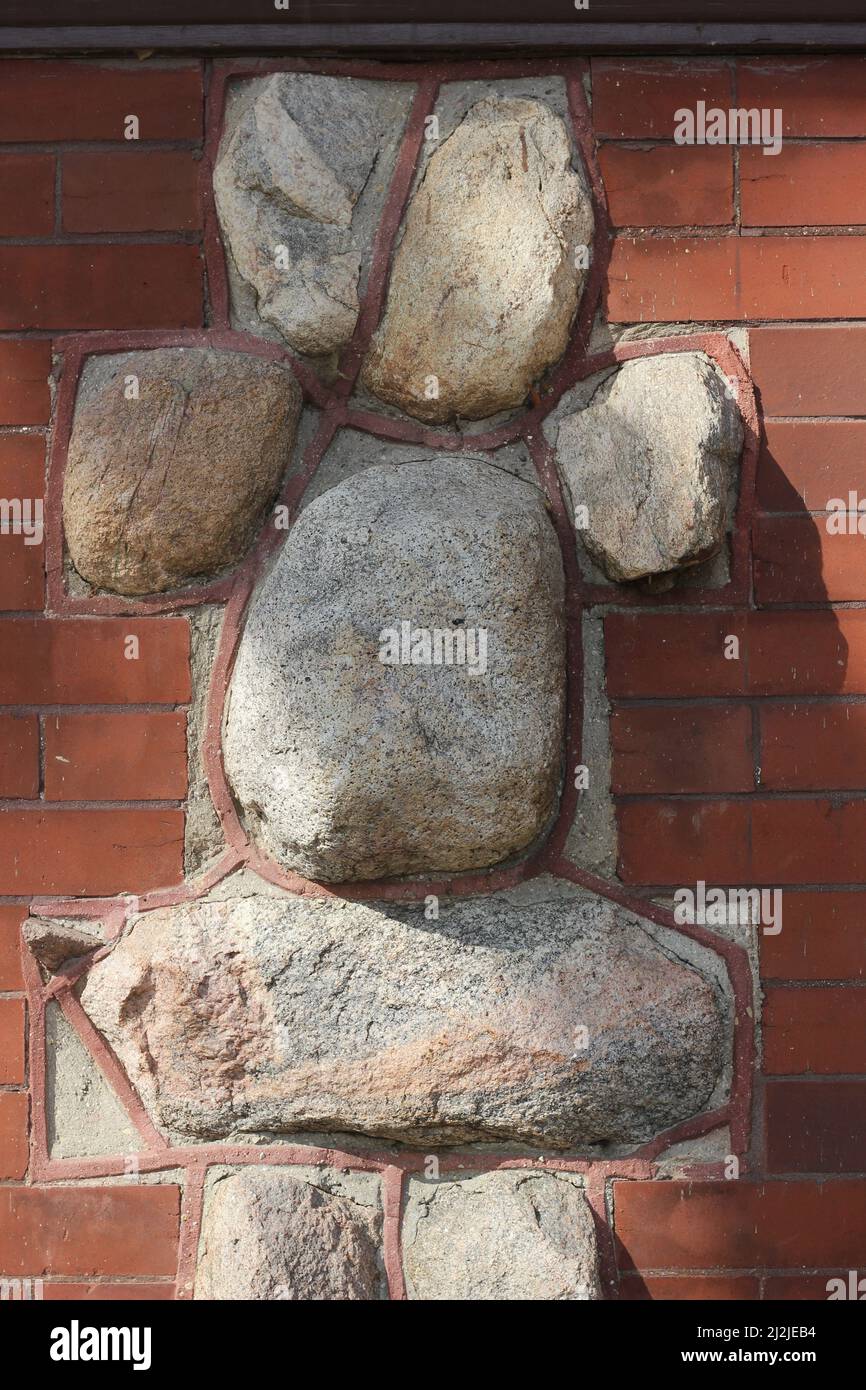 Rustic stone wall built with round boulders and granite stones Stock ...