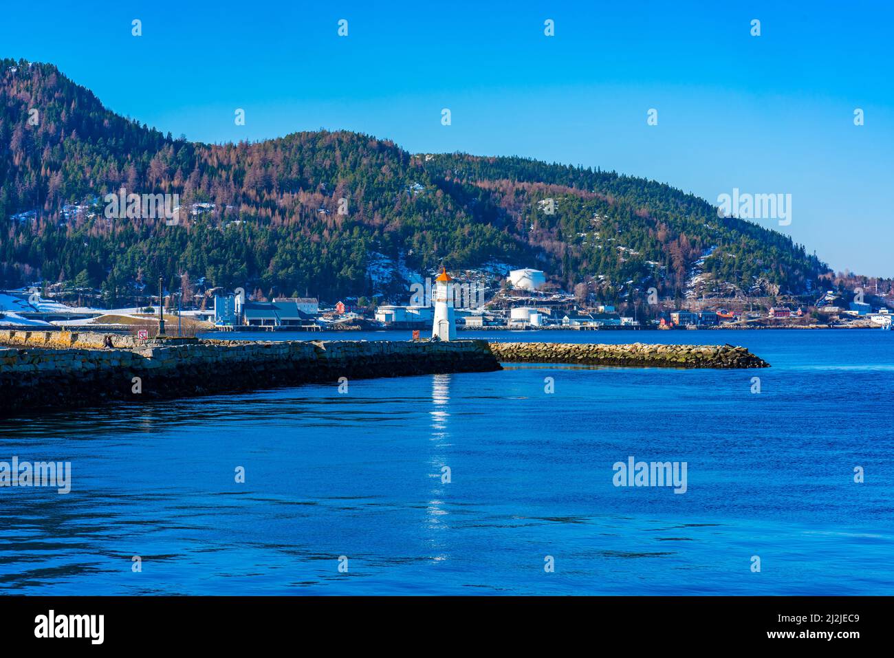 Skansen guest marina with moored sailboats with Skansen lighthouse at ...