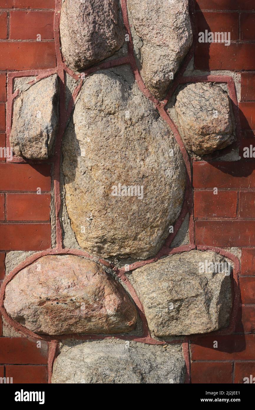 Rustic stone wall built with round boulders and granite stones Stock ...
