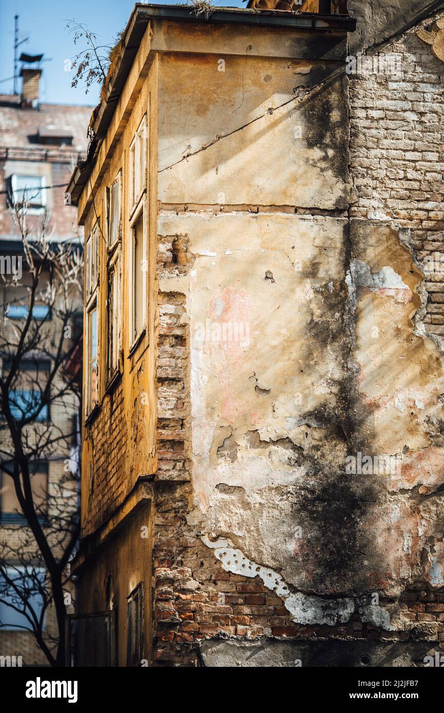 The vertical shot of an old building wall taken from a side Stock Photo - Alamy