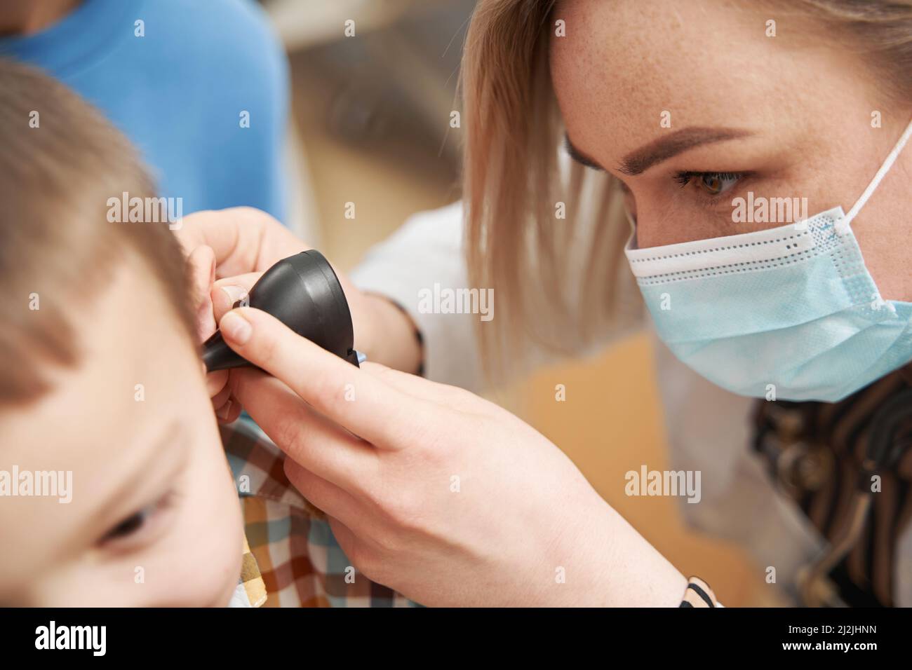 Check child ear hi-res stock photography and images - Alamy