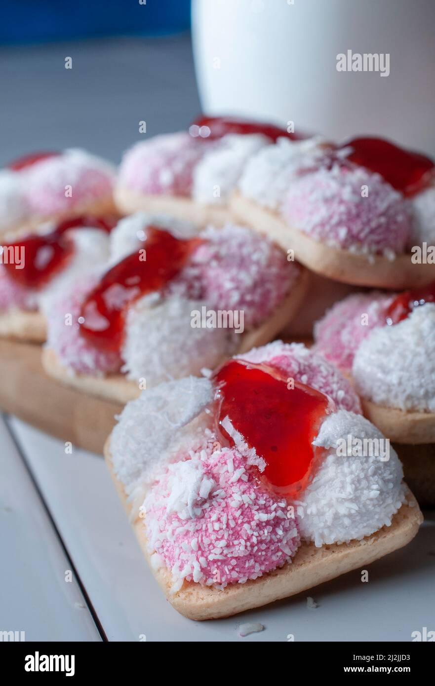 cookies with marshmallow, dried coconut flakes and strawberry jam, with ...
