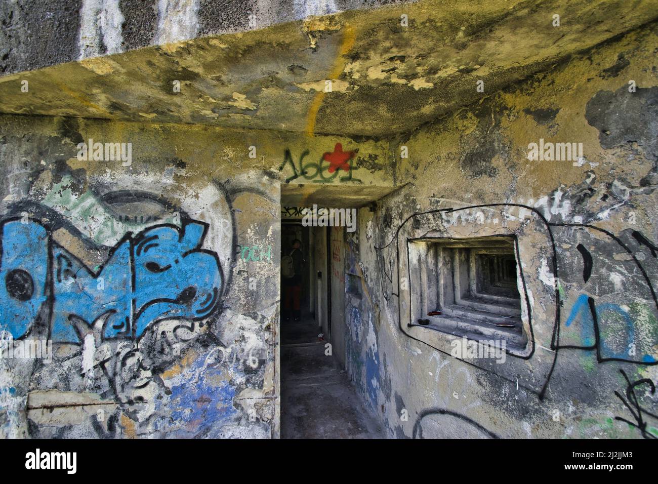 A beautiful closeup shot of an old stone hole inside a bunker wall with ...