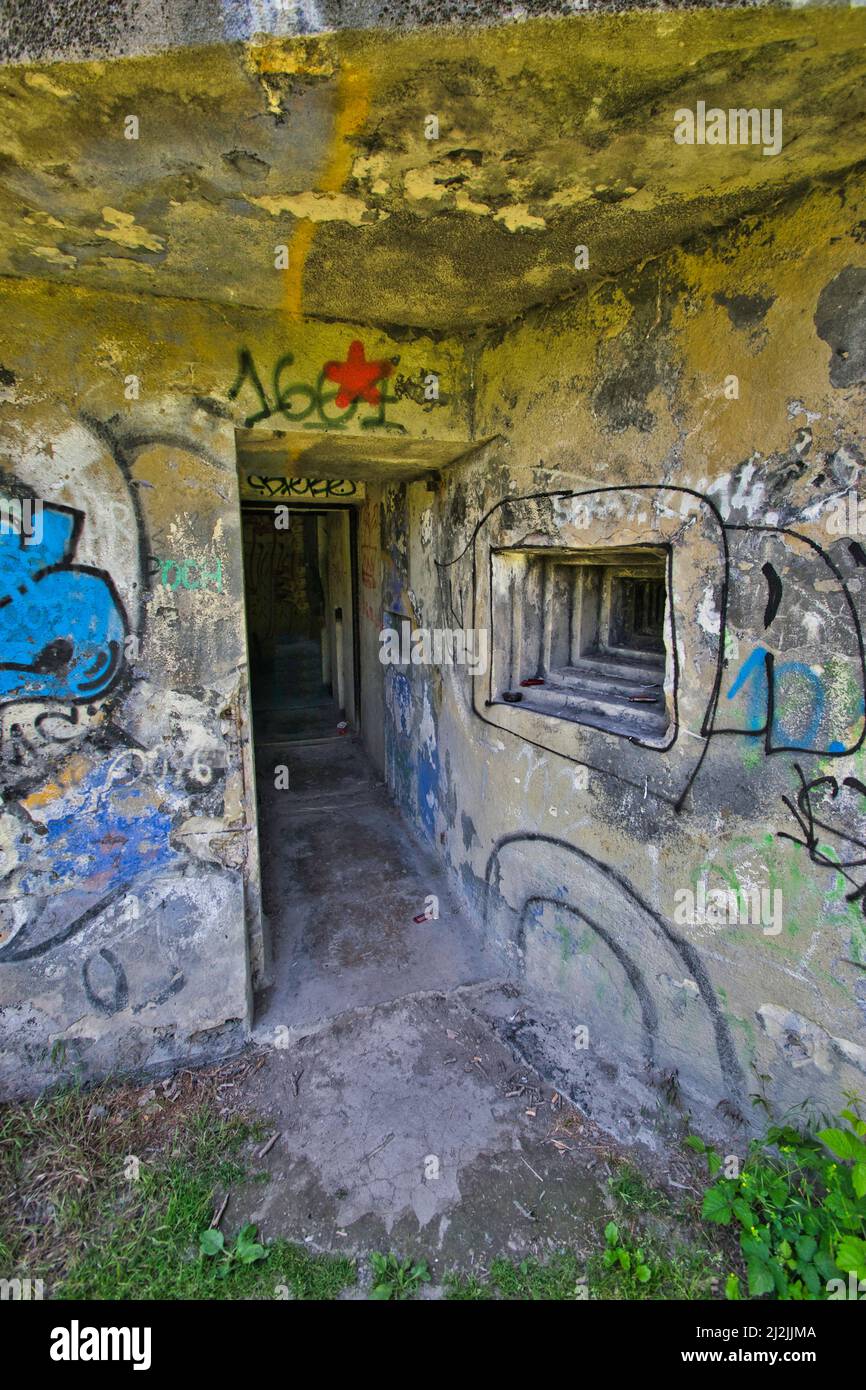 A beautiful closeup shot of an old stone hole inside a bunker wall with ...