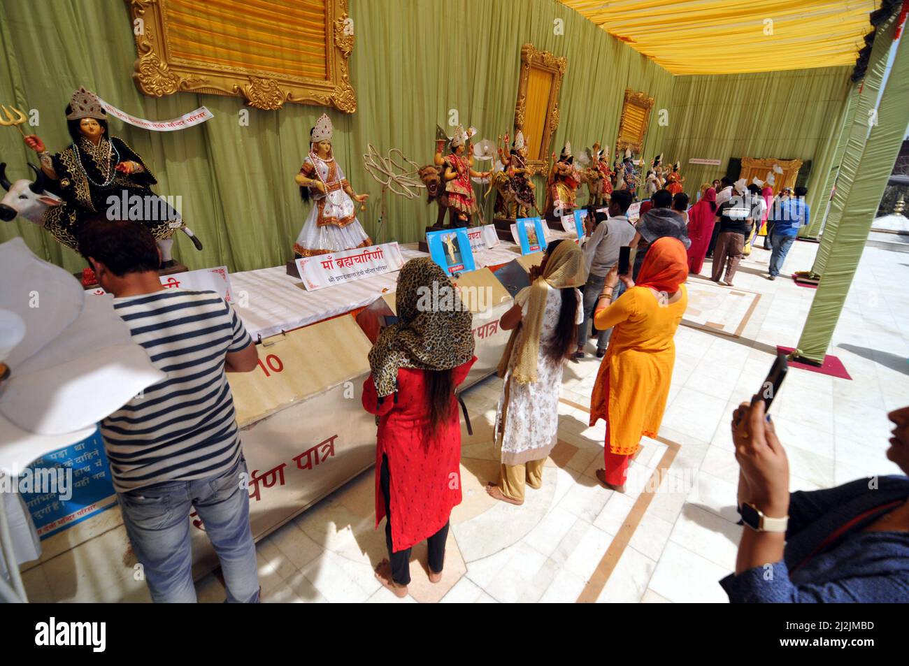 A long queue of devotees for pray of Jhandewali Idol and to see the ...