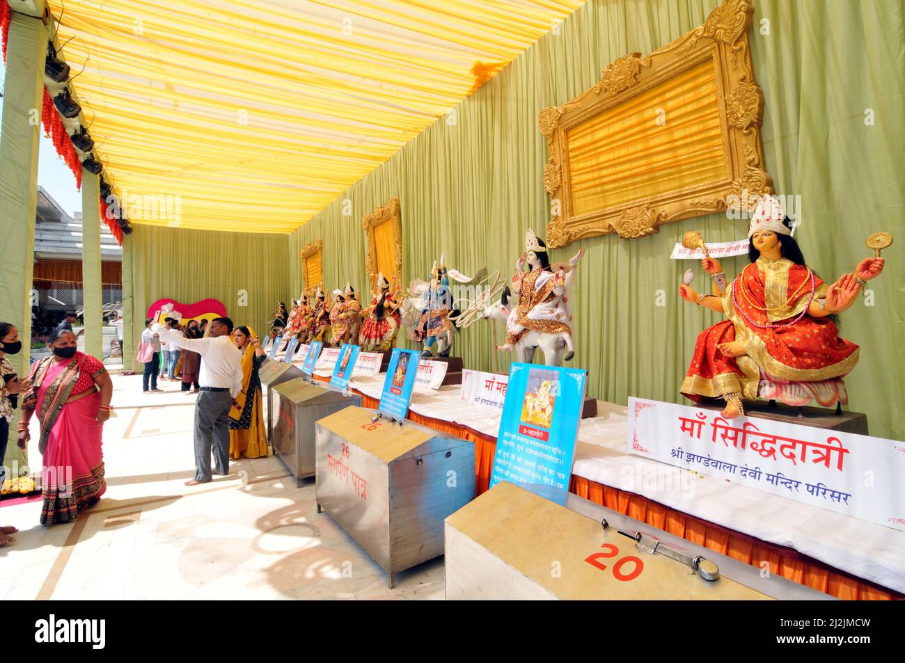A long queue of devotees for pray of Jhandewali Idol and to see the ...
