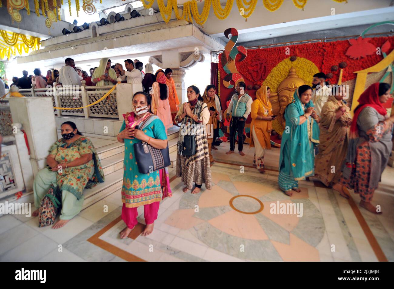 A long queue of devotees for pray of Jhandewali Idol and to see the ...