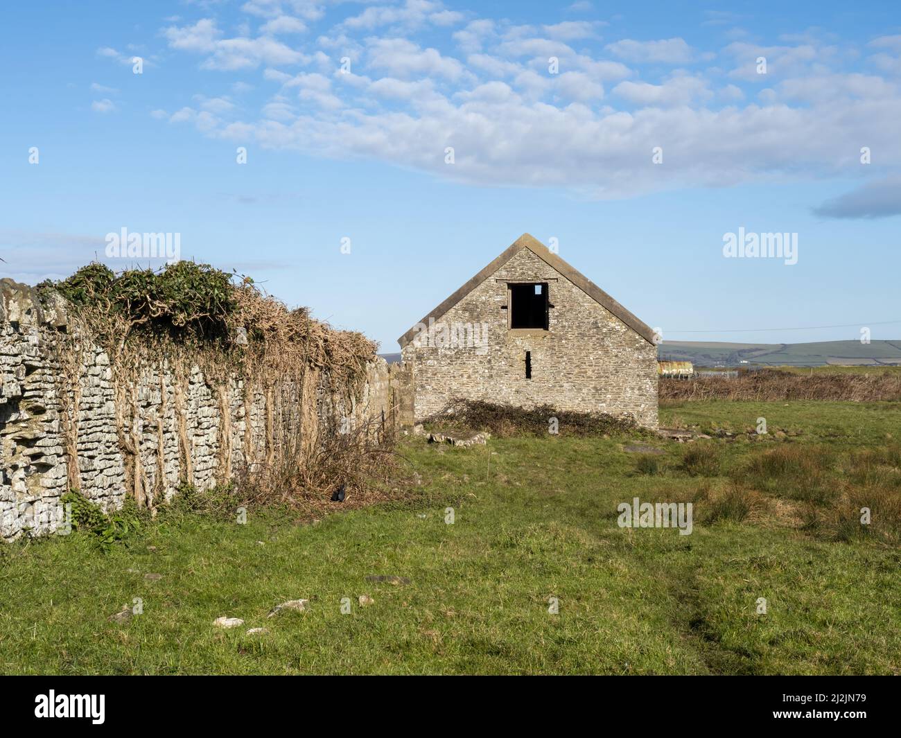 Old stone barn and wall, Devon, England, UK Stock Photo - Alamy