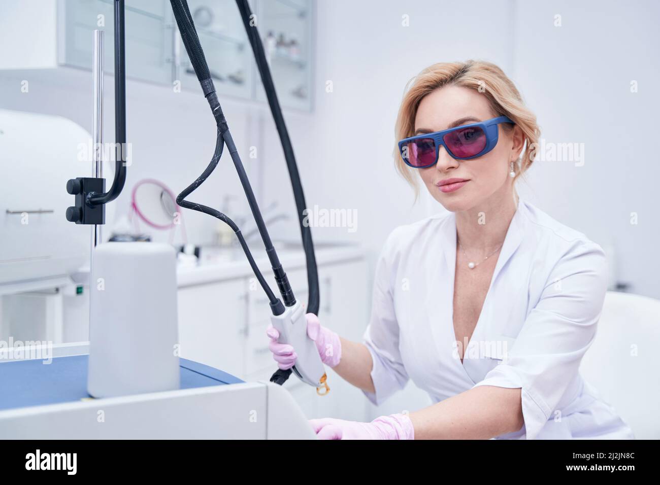 Preparing for laser hi-res stock photography and images - Alamy
