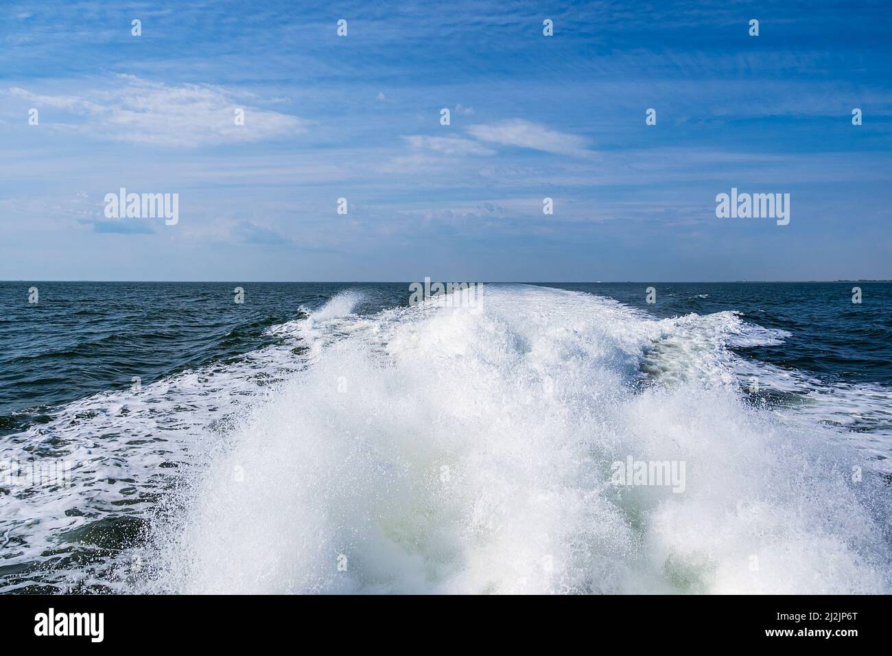Stern wave of a ship on the North Sea Stock Photo - Alamy