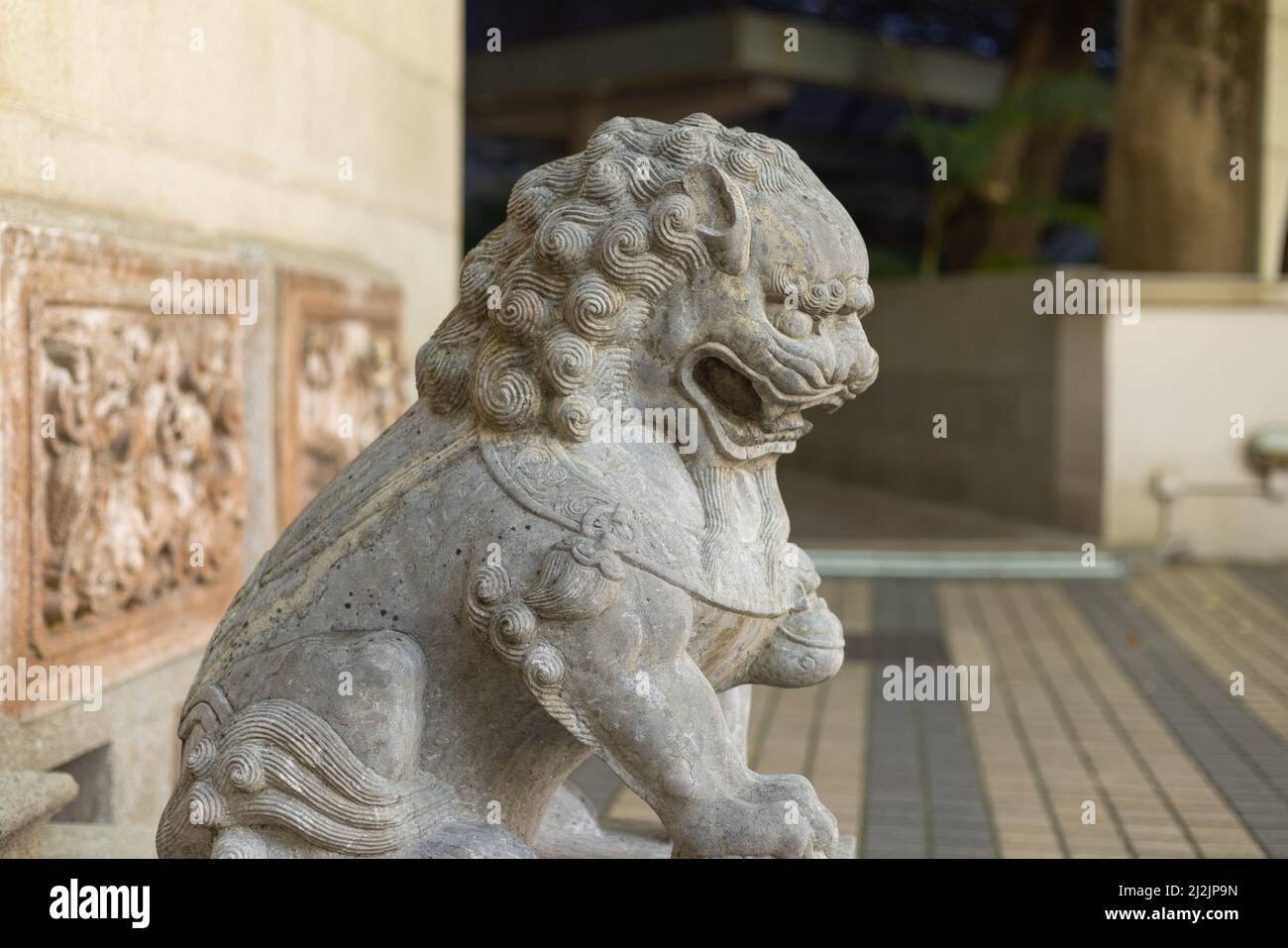 Stone Lion statue in front gate of old building in Hong Kong, China ...
