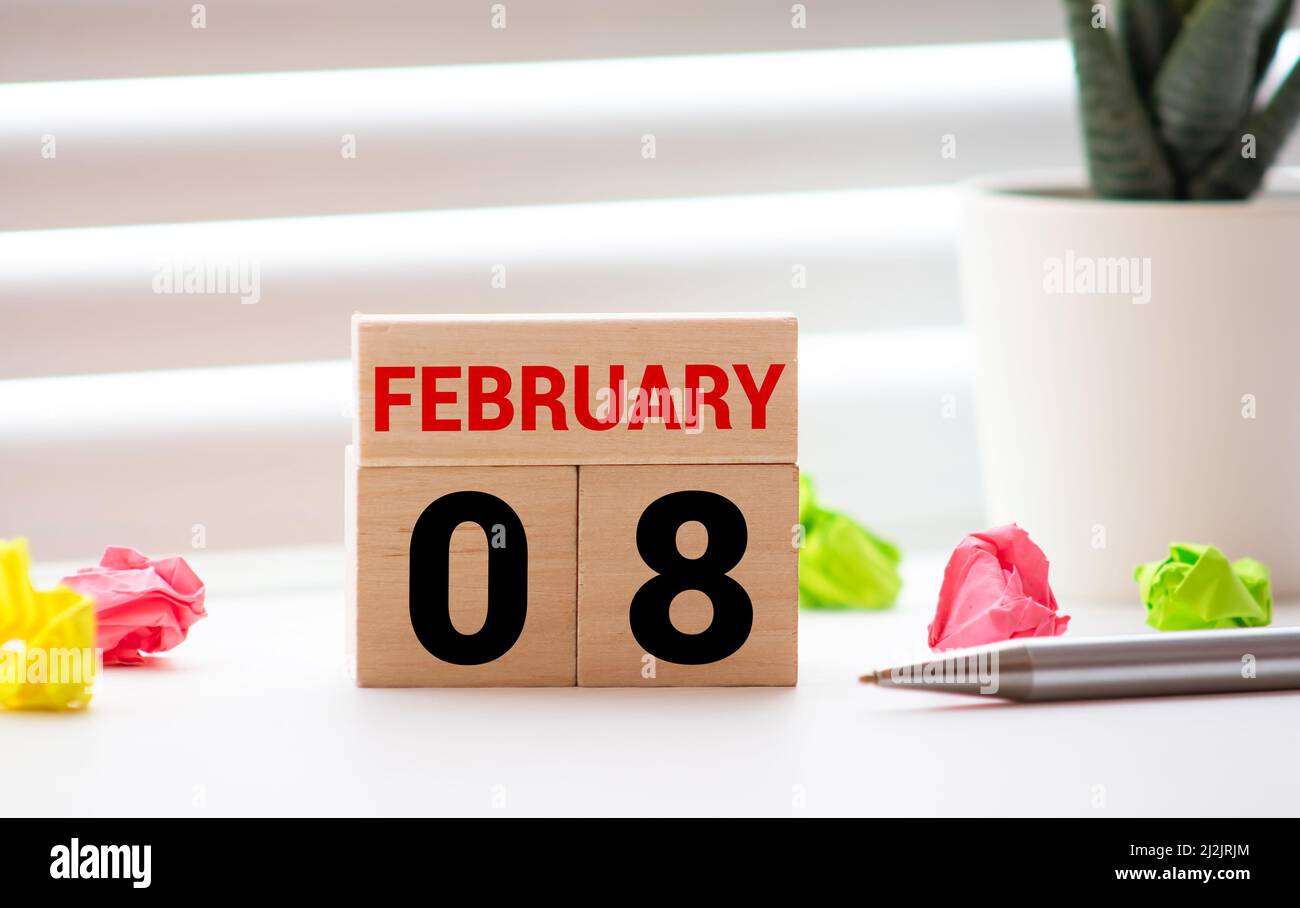 Wooden cubes calendar with the date of February 08. Concept calendar ...