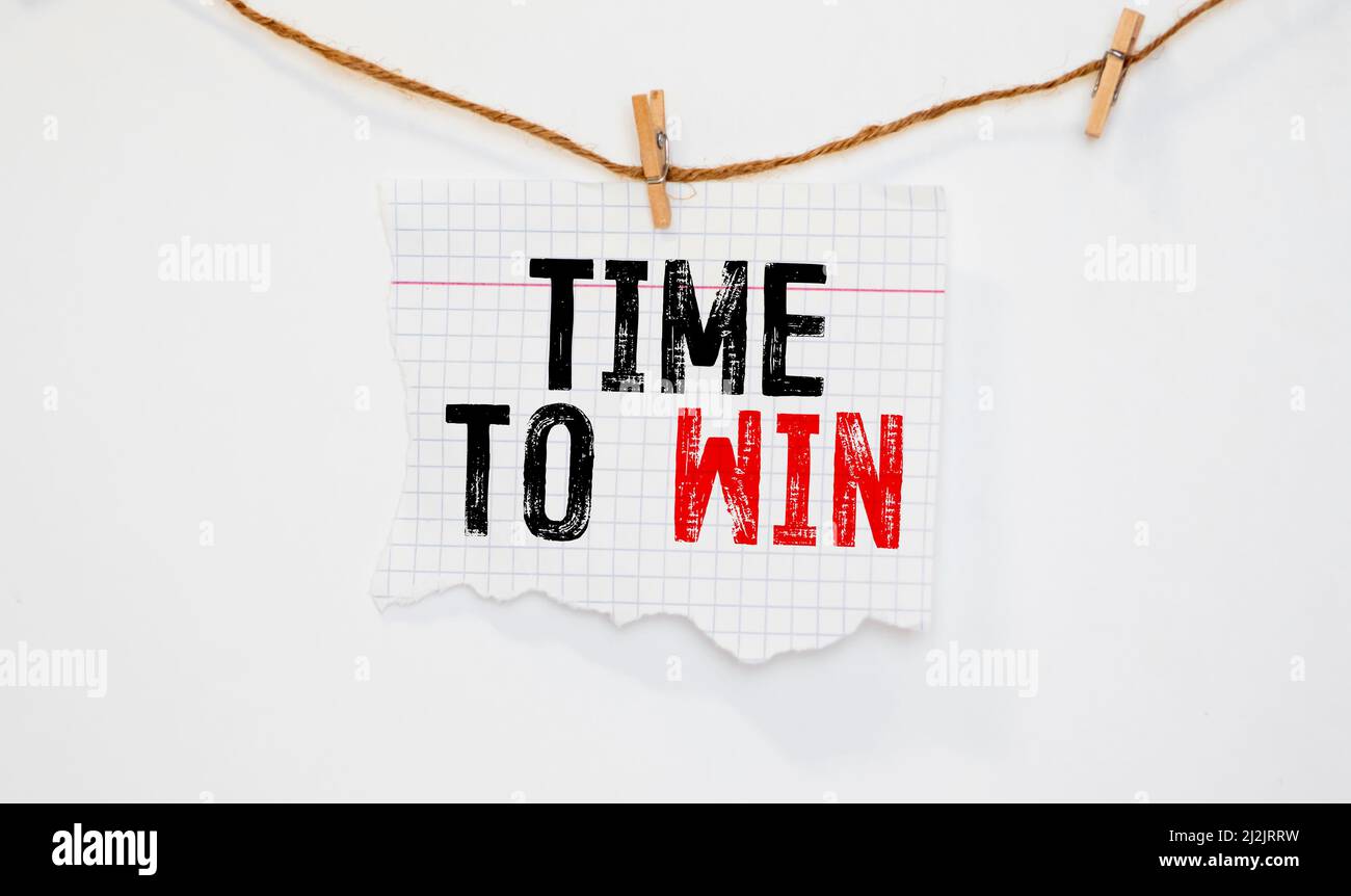 Time to win. Business Concept on white paper Stock Photo - Alamy