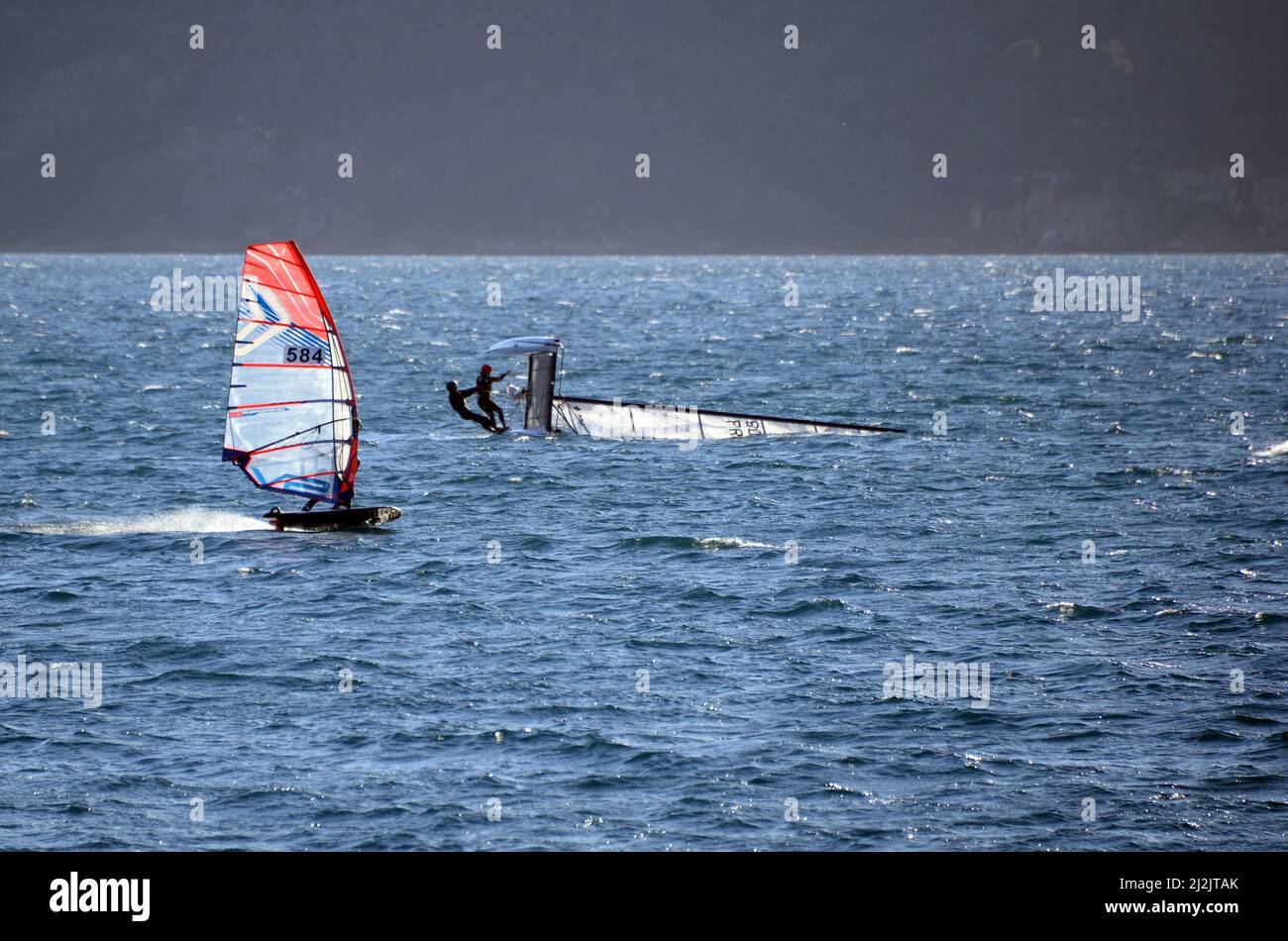 Windsurfing on foil at full speed Stock Photo - Alamy
