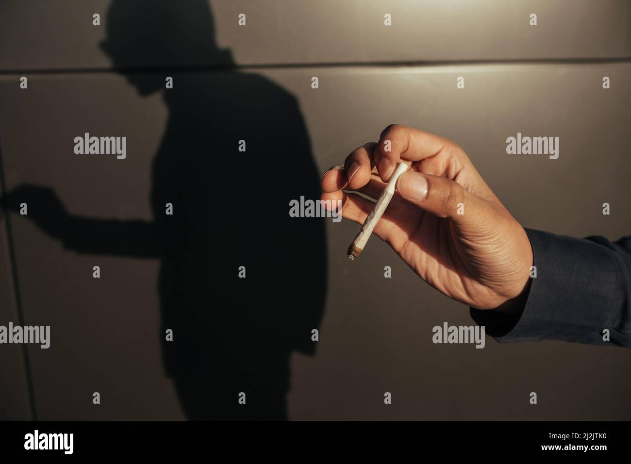 Weed joint and storing container Stock Photo - Alamy