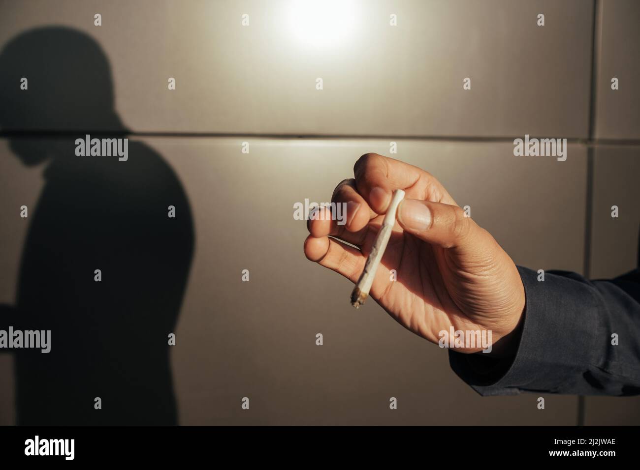 Weed joint and storing container Stock Photo - Alamy