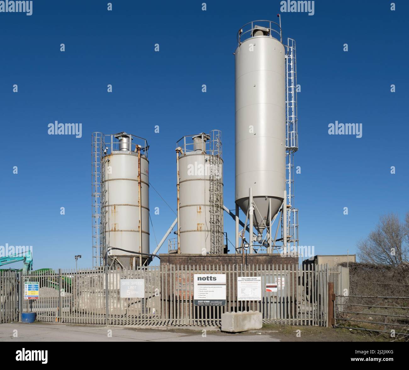 YELLAND QUAY, NORTH DEVON, ENGLAND - MARCH 5 2022: Industrial silos ...