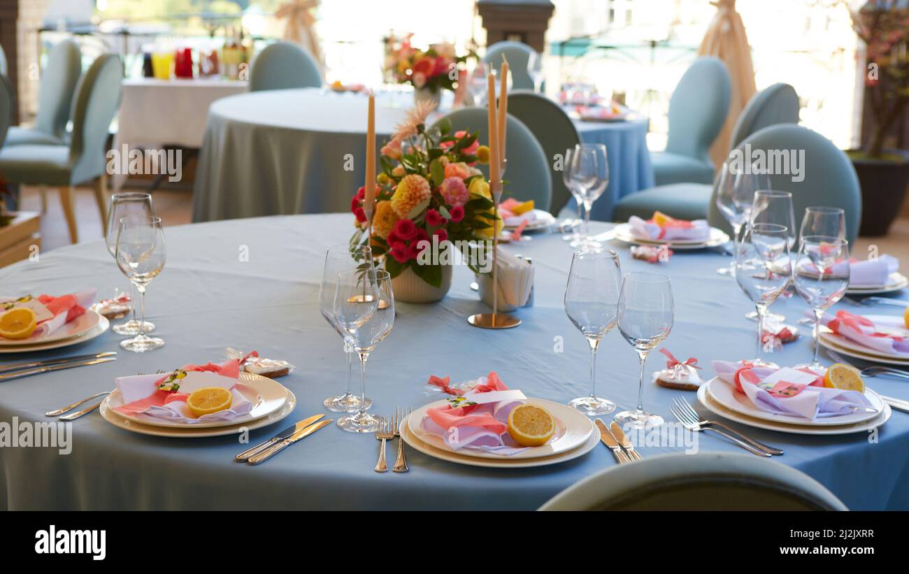 Wedding day event organization table setting decor Stock Photo - Alamy