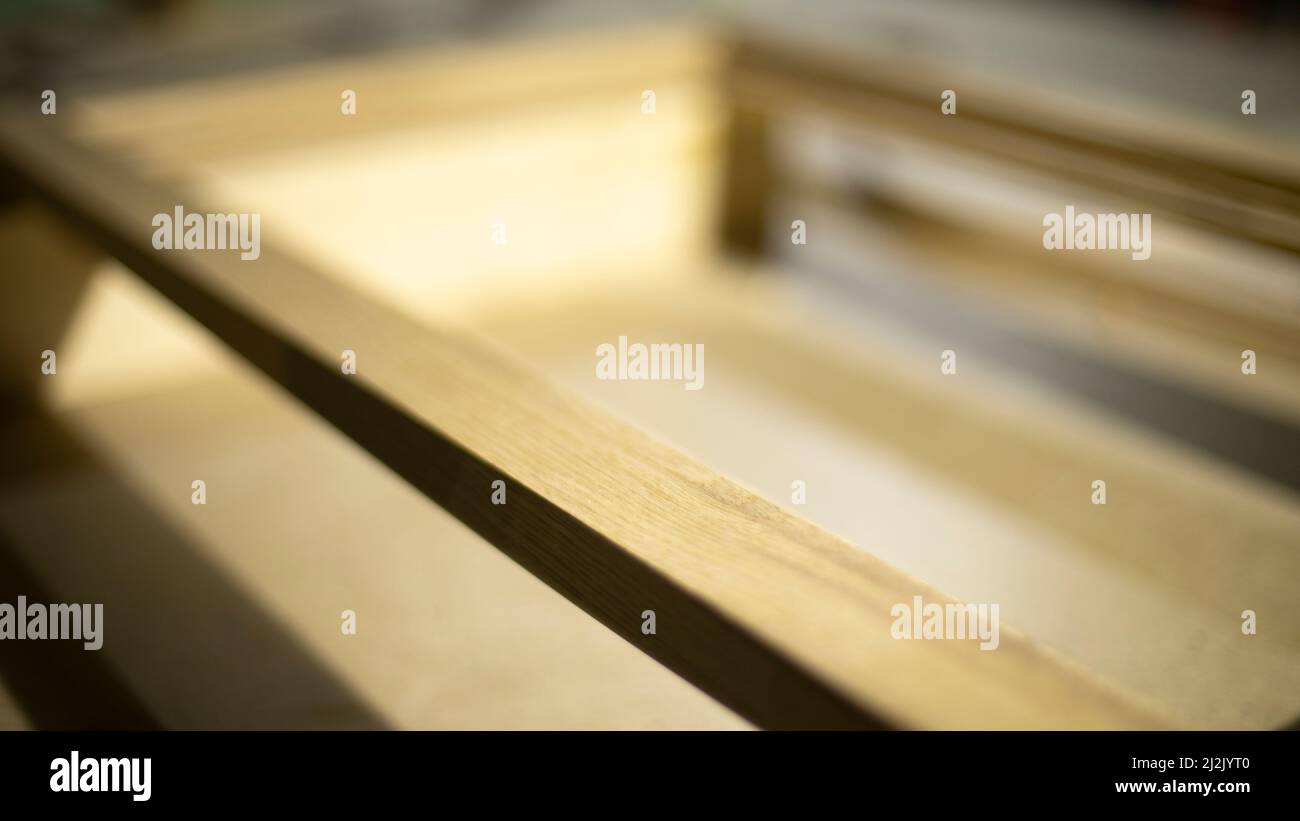 Boards in carpentry workshop. Raw wood. Details of furniture creation ...