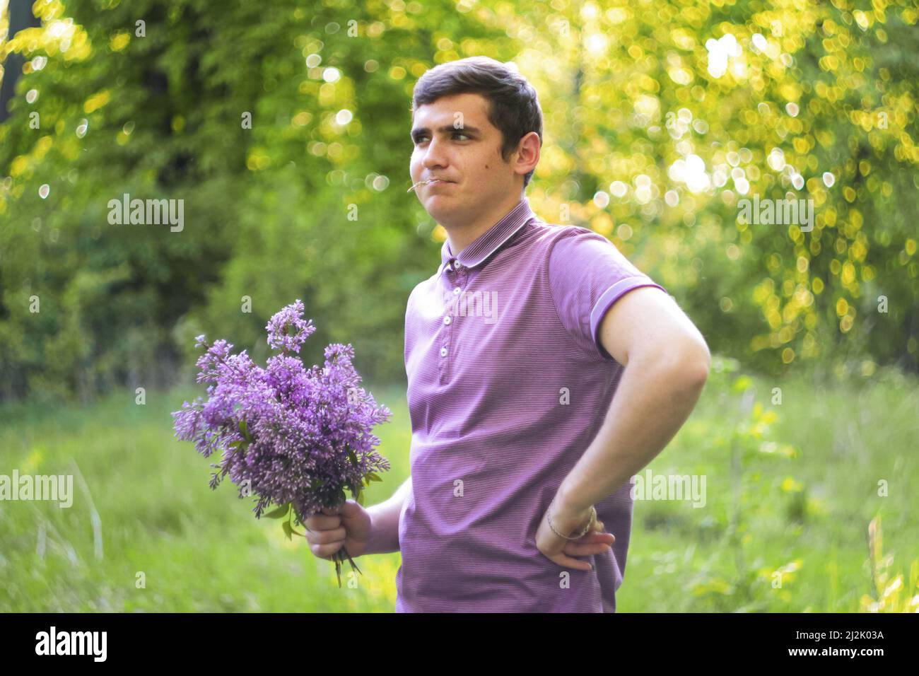 Defocus pleasant cheerful handsome smiling young guy looking aside and ...