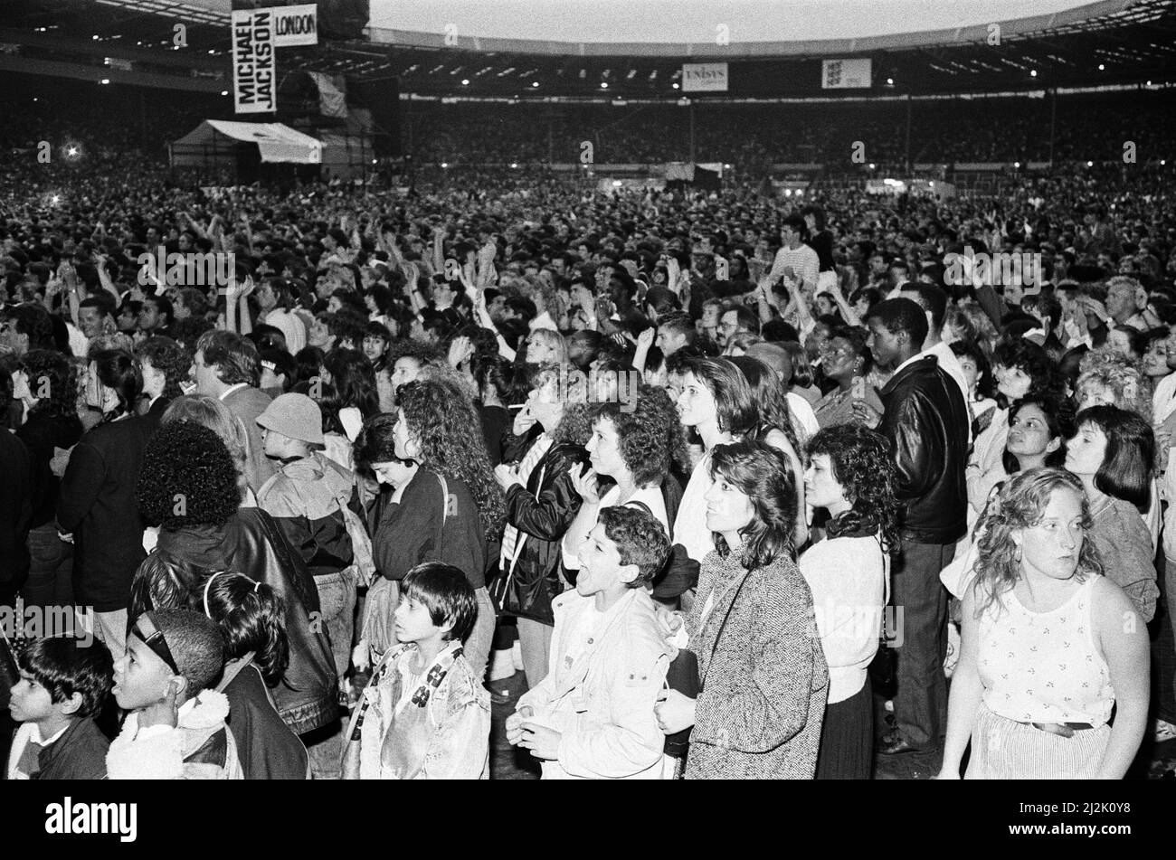 Michael Jackson fans in the audience at Wembley Stadium during his "Bad ...