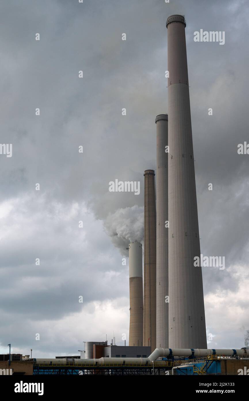 Air pollution from power plant chimneys Stock Photo - Alamy
