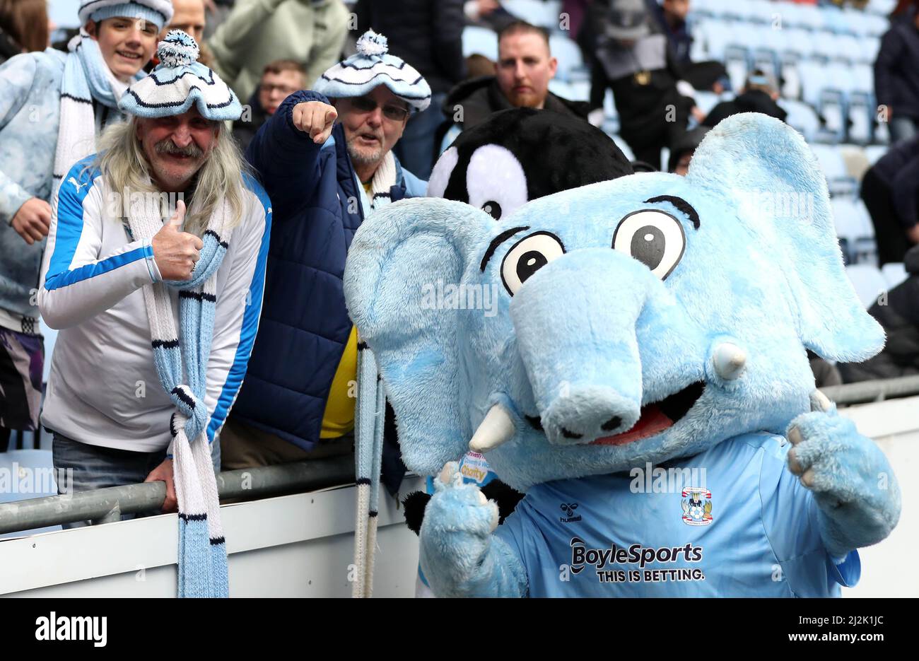 Coventry City mascot Sky Blue Sam with fans at half time during the Sky ...