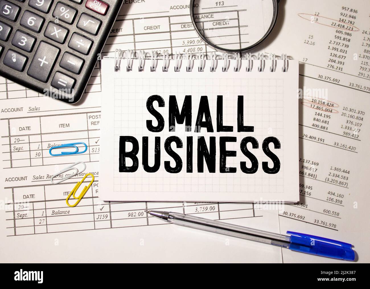 Small Business Conceptual background with calculator and papers Stock ...