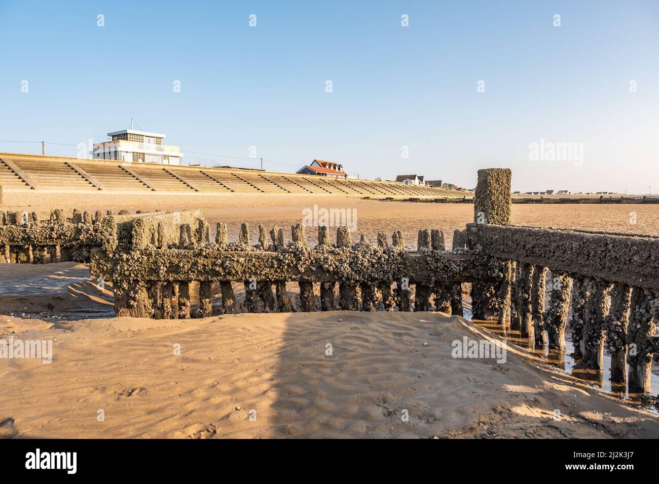 Wooden groynes and sea breakers on Heacham beach, North Norfolk coast ...